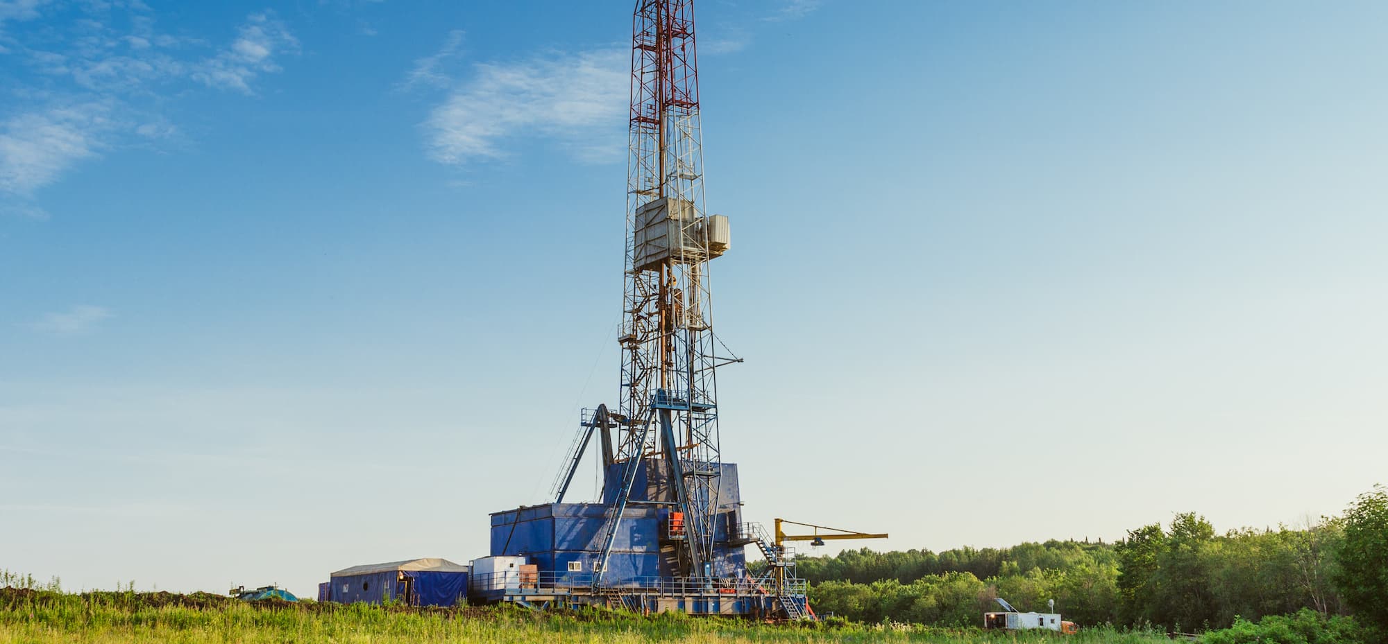Land oil drilling rig blue sky | TIOT